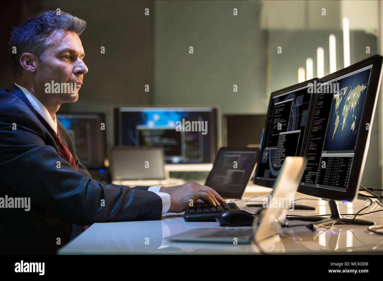 Person working with data on computers hi-res stock photography and ...