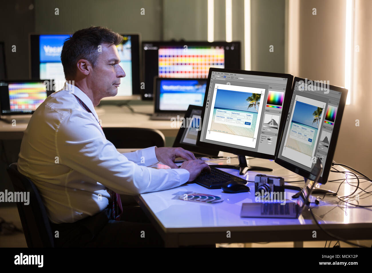 Side View Of A Male Designer Editing Photo On Computer Stock Photo - Alamy