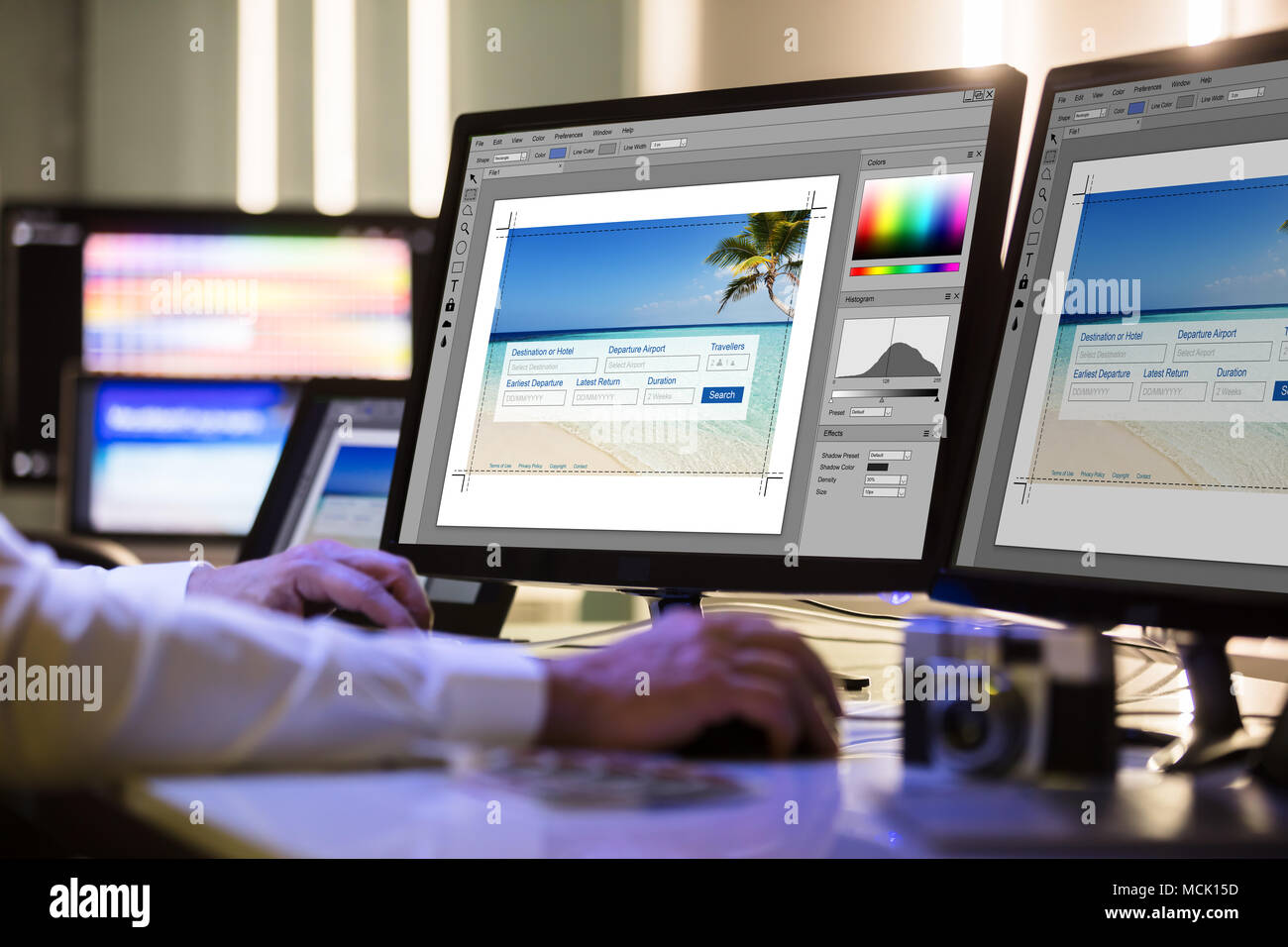Close-up Of A Designer's Hand Working On Multiple Computer Screen At ...