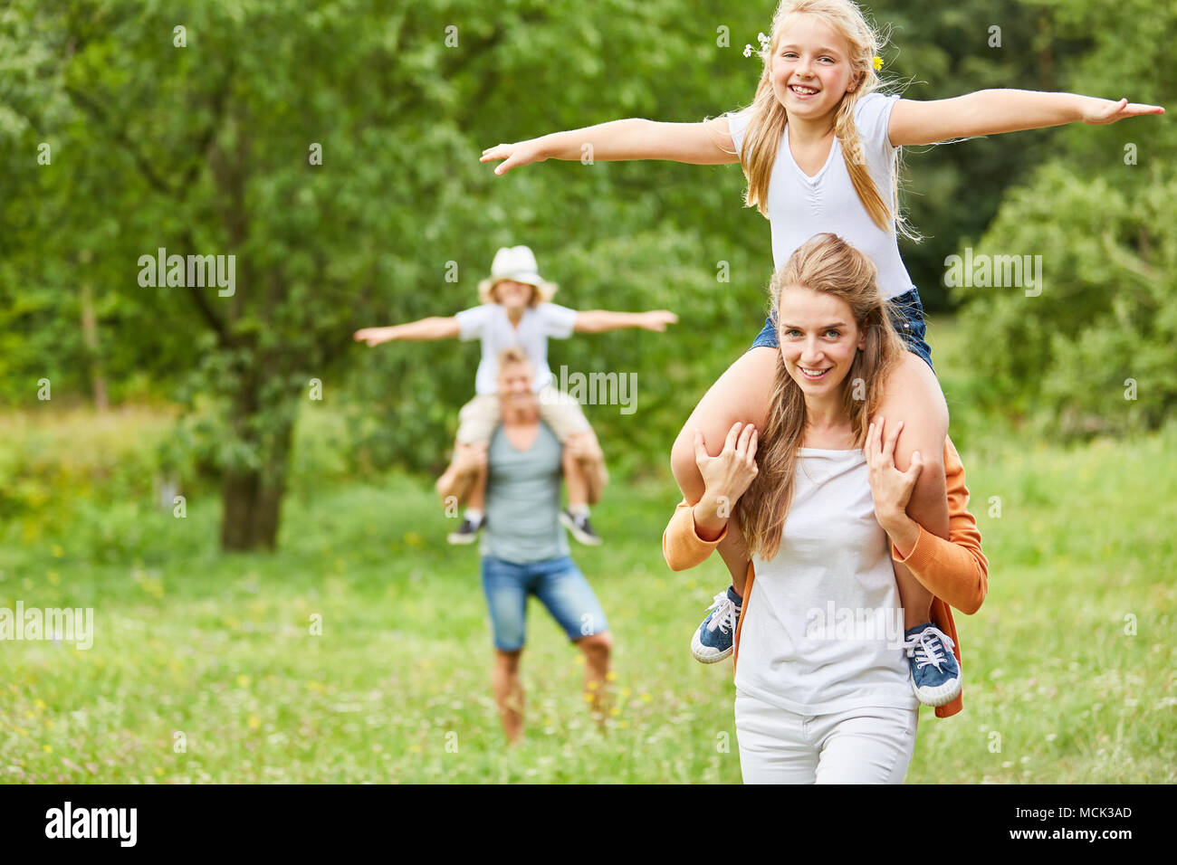 Mother With Daughter Piggyback High Resolution Stock Photography and ...