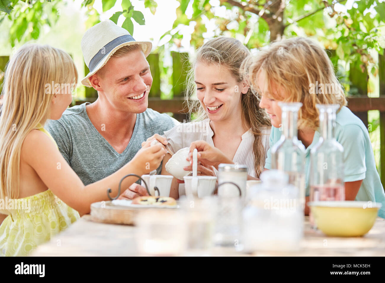 Parents drinking with children hi-res stock photography and images - Alamy