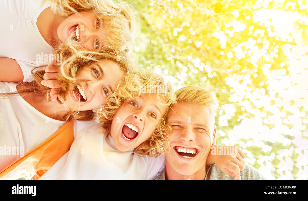 Family and children are thrilled as a team and amazed by a surprise ...