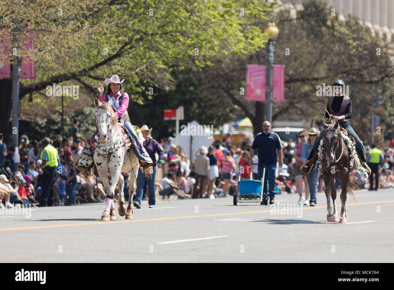 Washington, D.C., USA - April 14, 2018 A woman riding a horse covered ...