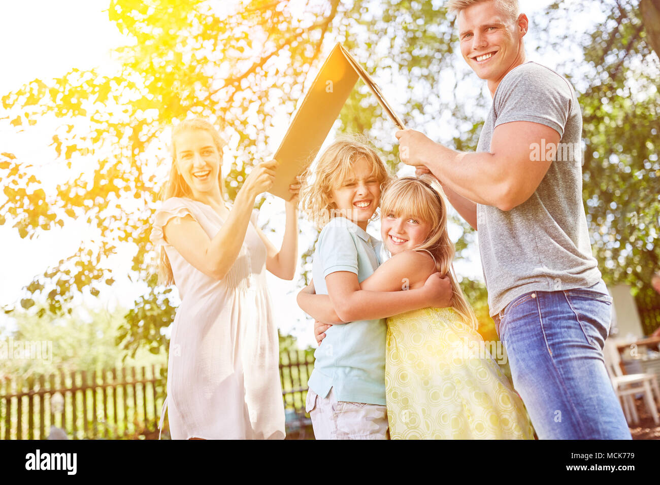 Parents children hold roof hi-res stock photography and images - Alamy