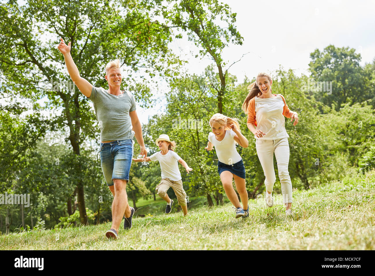 Girl running over meadow hi-res stock photography and images - Alamy