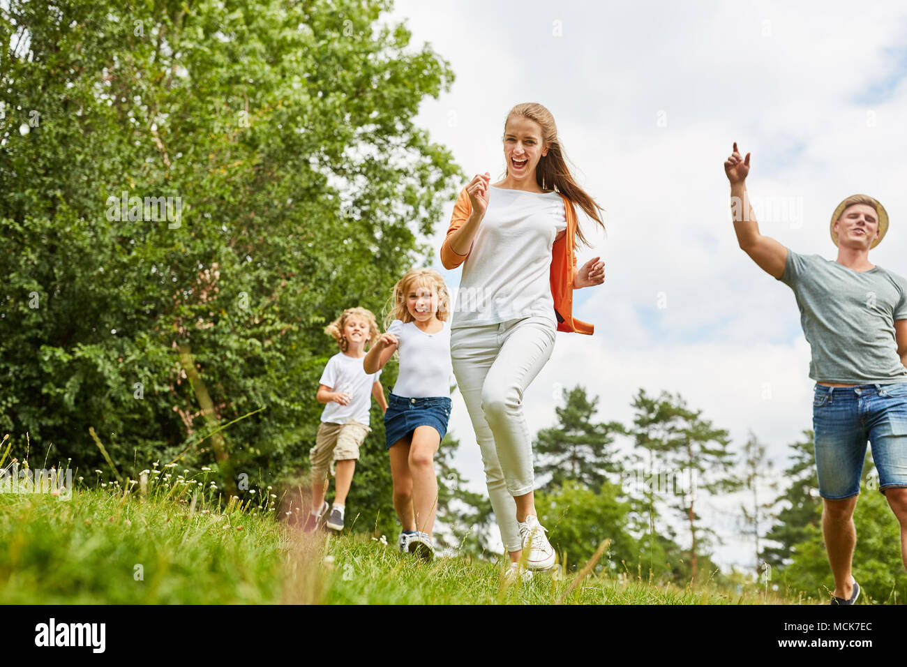 Carefree woman man run across hi-res stock photography and images - Alamy