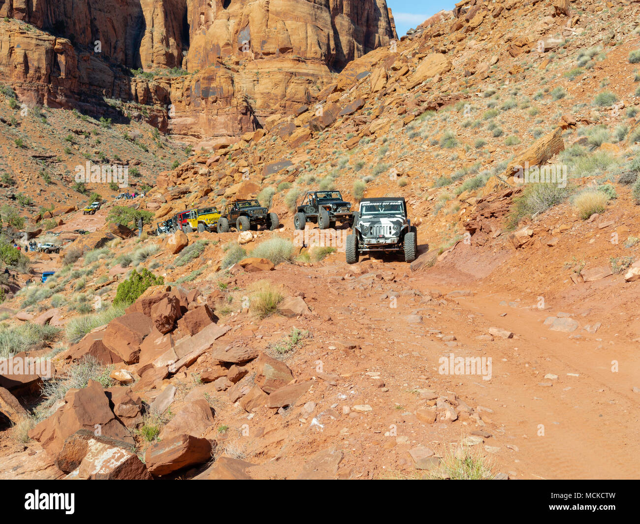 Jeeps crawl through Pritchett Canyon near Moab, Utah during Jeep Week ...