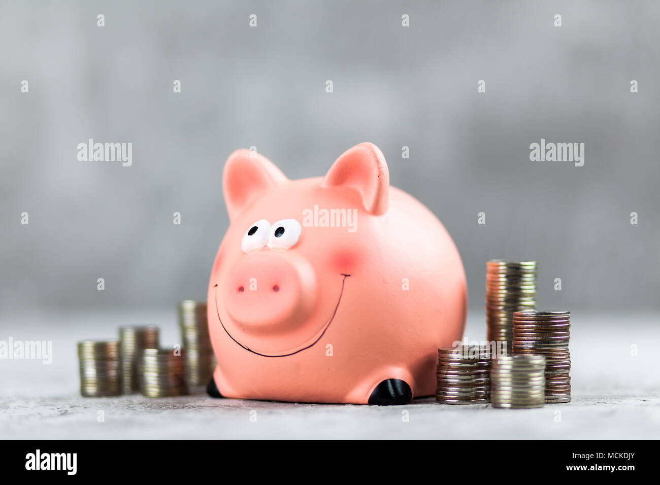 Pink piggy bank stack hi-res stock photography and images - Alamy