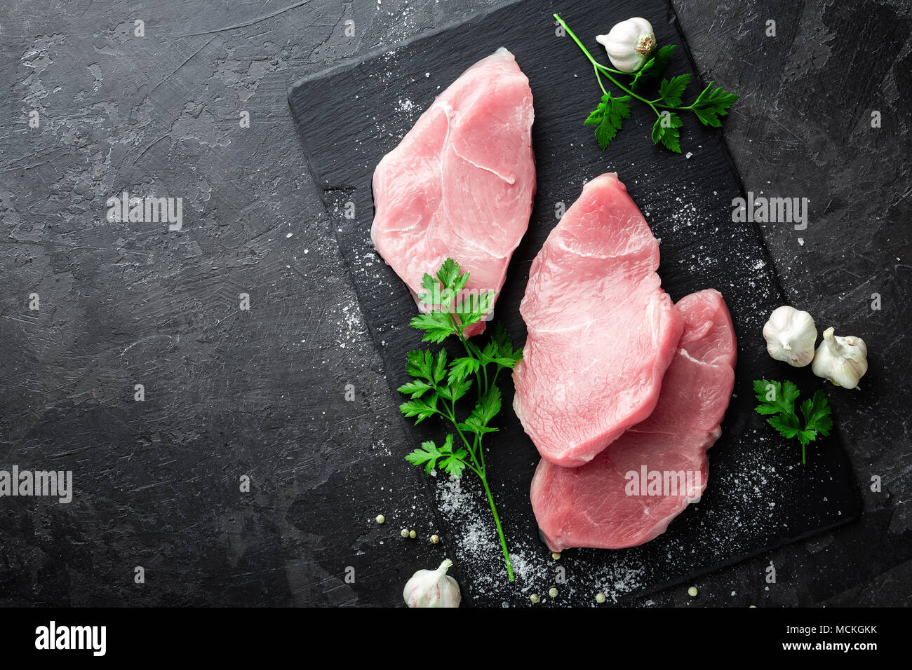 Raw turkey meat. Fresh turkey meat steakes sliced Stock Photo - Alamy