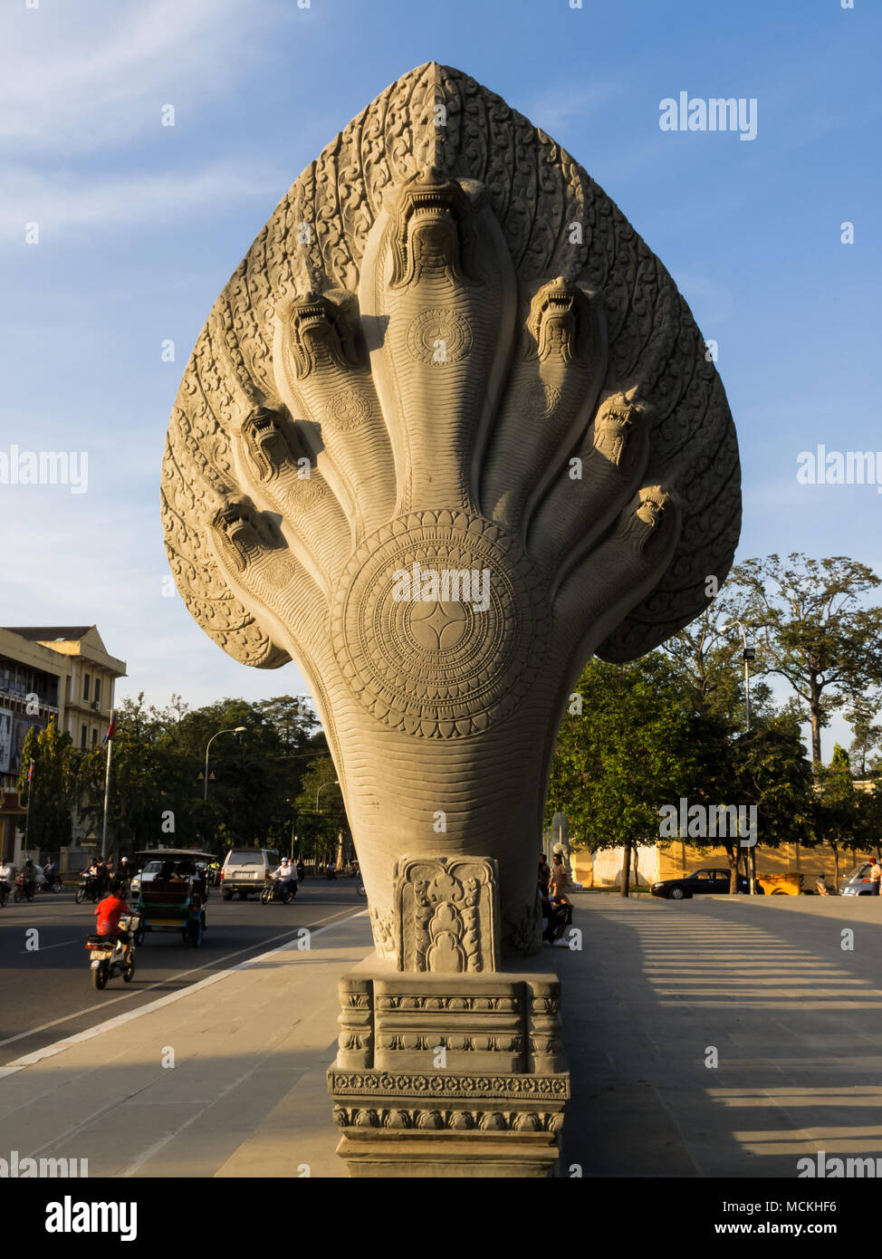 Stone naga statue in Phnom Penh like a snakes head Stock Photo - Alamy