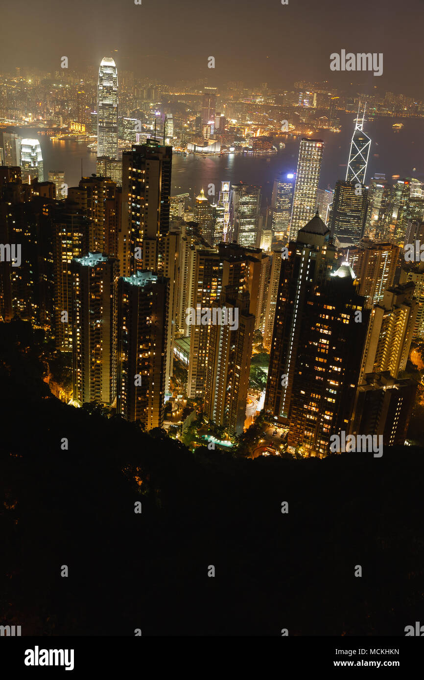 Hong Kong city skyline at night from Victoria Peak, vertical Stock ...