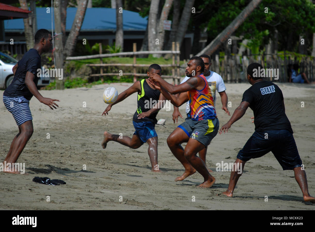 Fijian men playing rugby on Palm Beach, Pacific Harbour, Fiji Stock ...