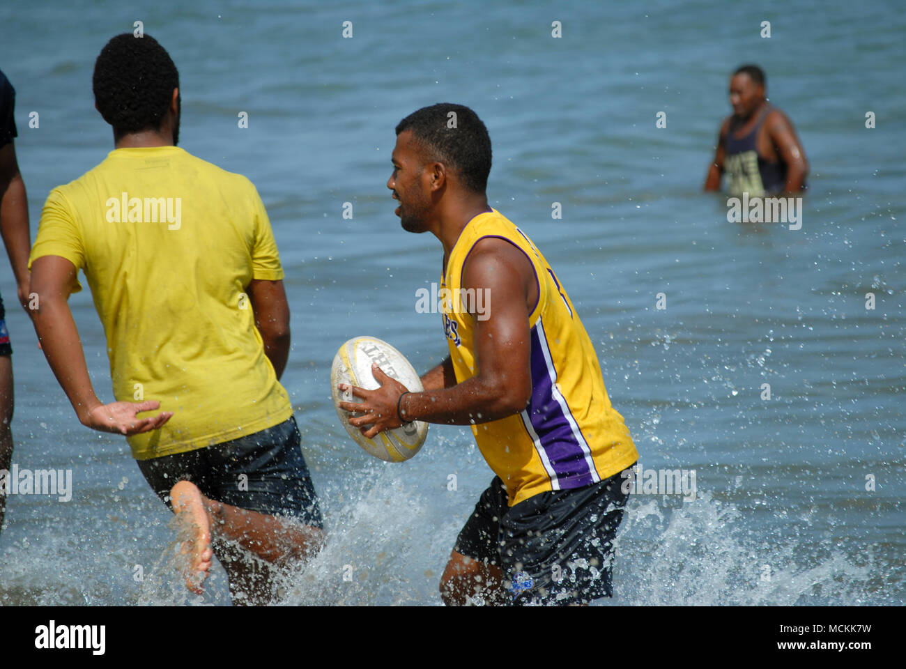Fijian men playing rugby on Palm Beach, Pacific Harbour, Fiji Stock ...