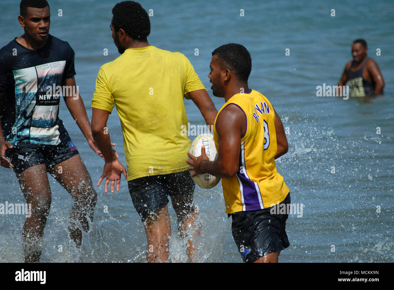 Fijian men playing rugby on Palm Beach, Pacific Harbour, Fiji Stock ...