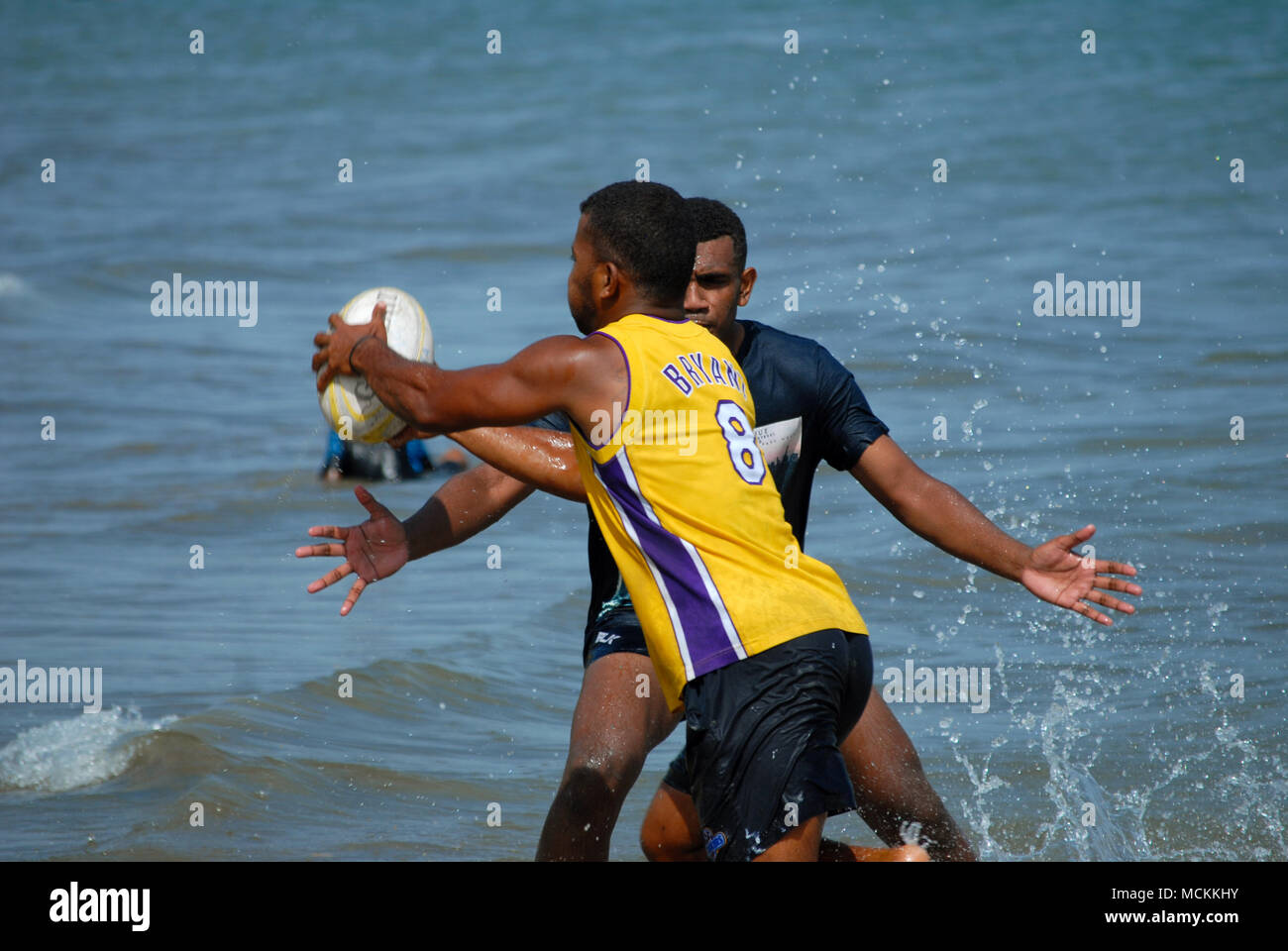 Fijian men playing rugby on Palm Beach, Pacific Harbour, Fiji Stock ...