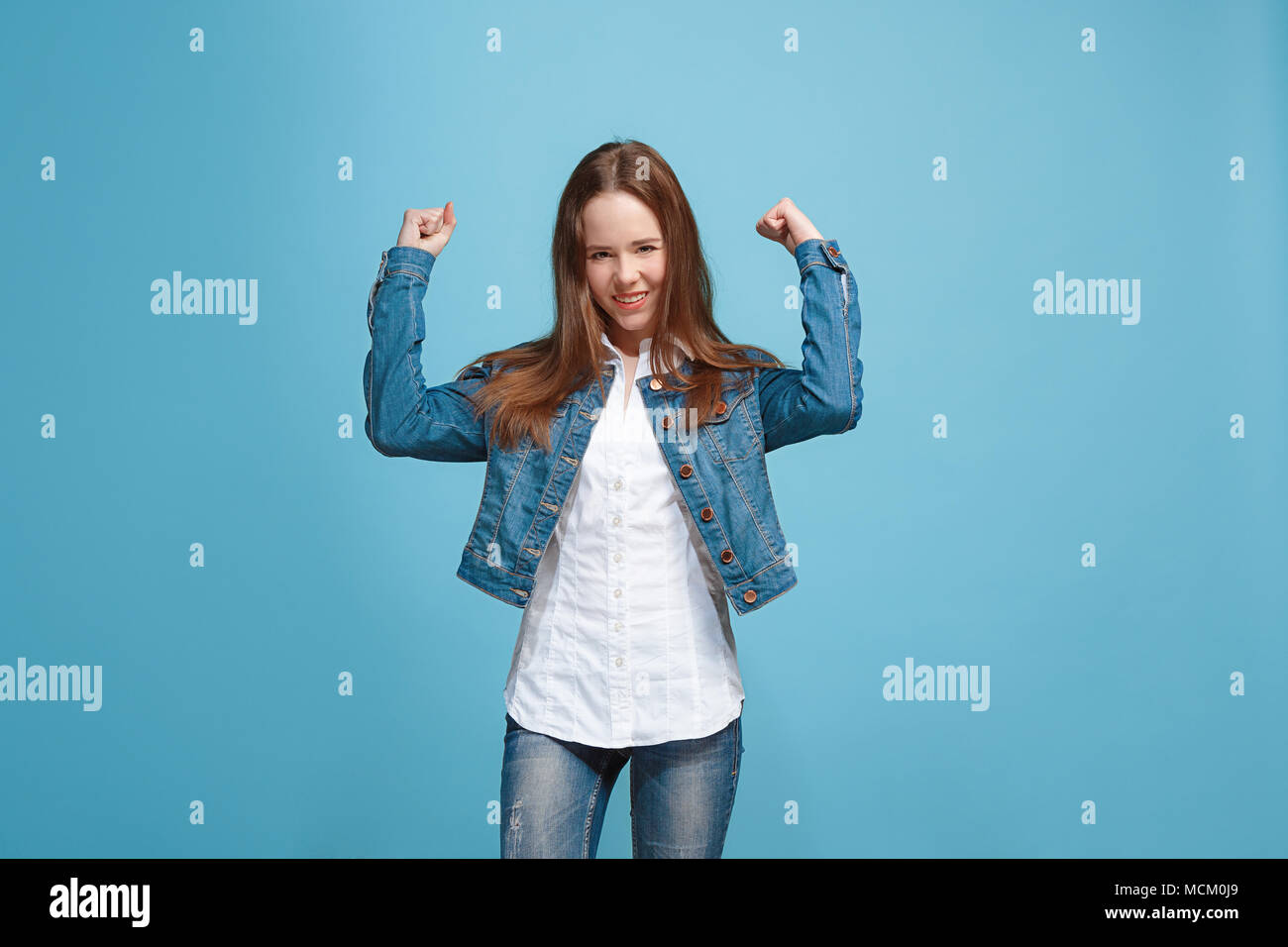 Happy success teen girl celebrating being a winner. Dynamic energetic ...