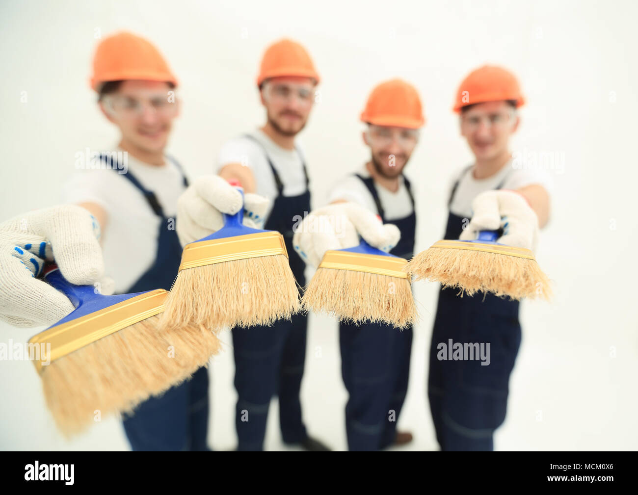 group of builders with different tools Stock Photo - Alamy