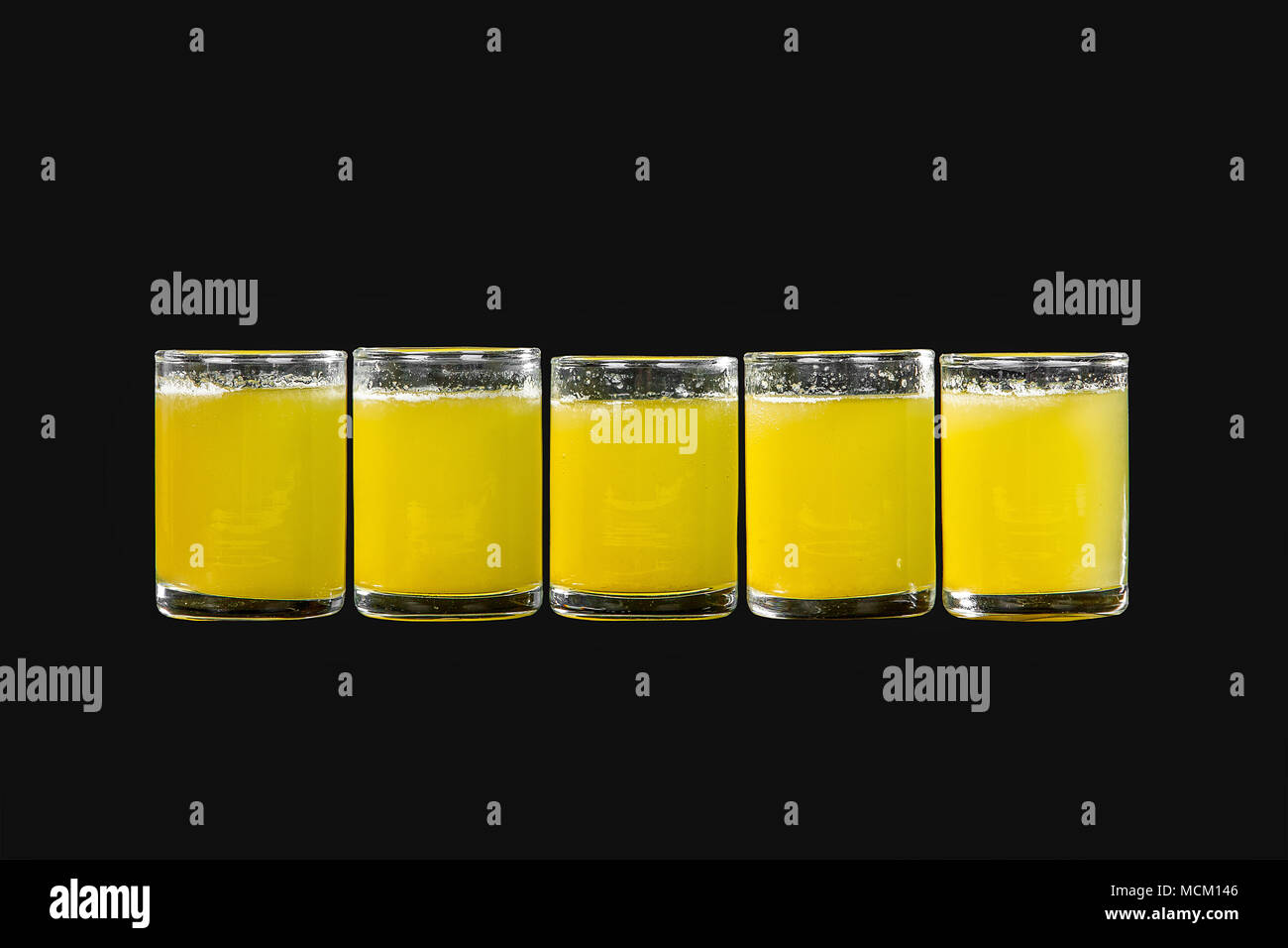 Single-color opaque cocktails, a set of shots in one row, five servings ...