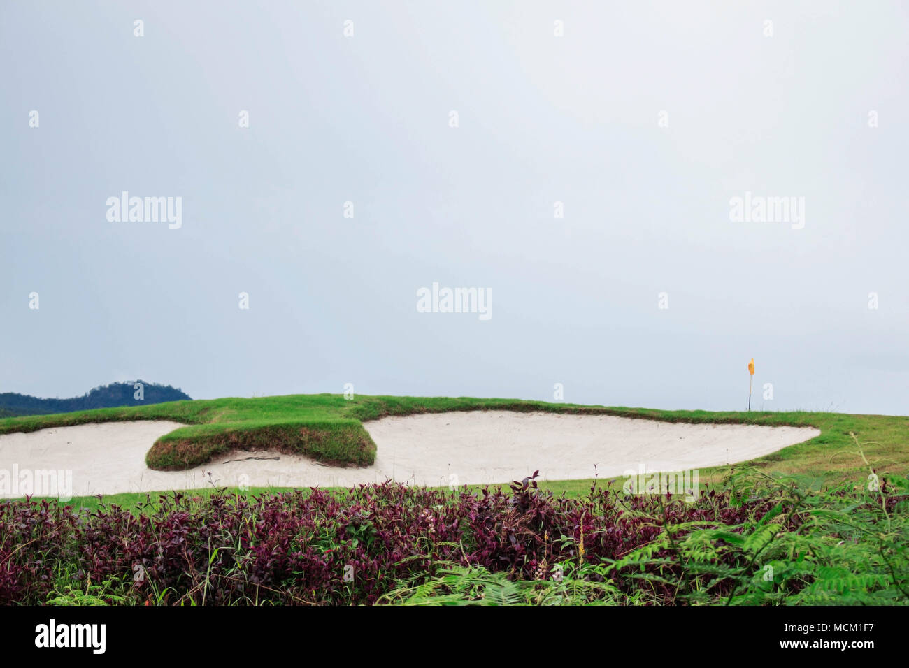 The mound of golf course and the sky Stock Photo - Alamy