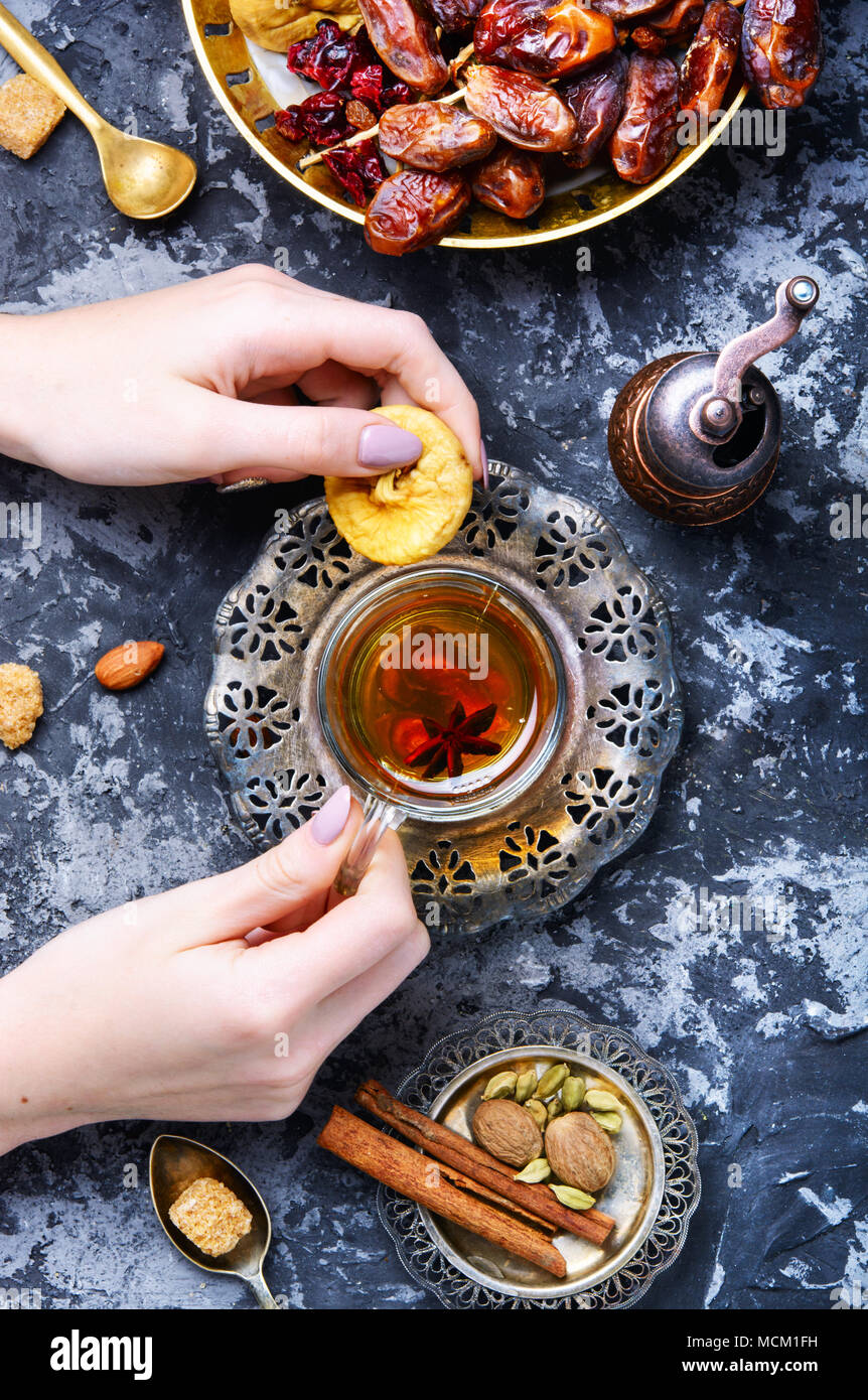 Still life with a cup of oriental tea and fig fruits Stock Photo - Alamy