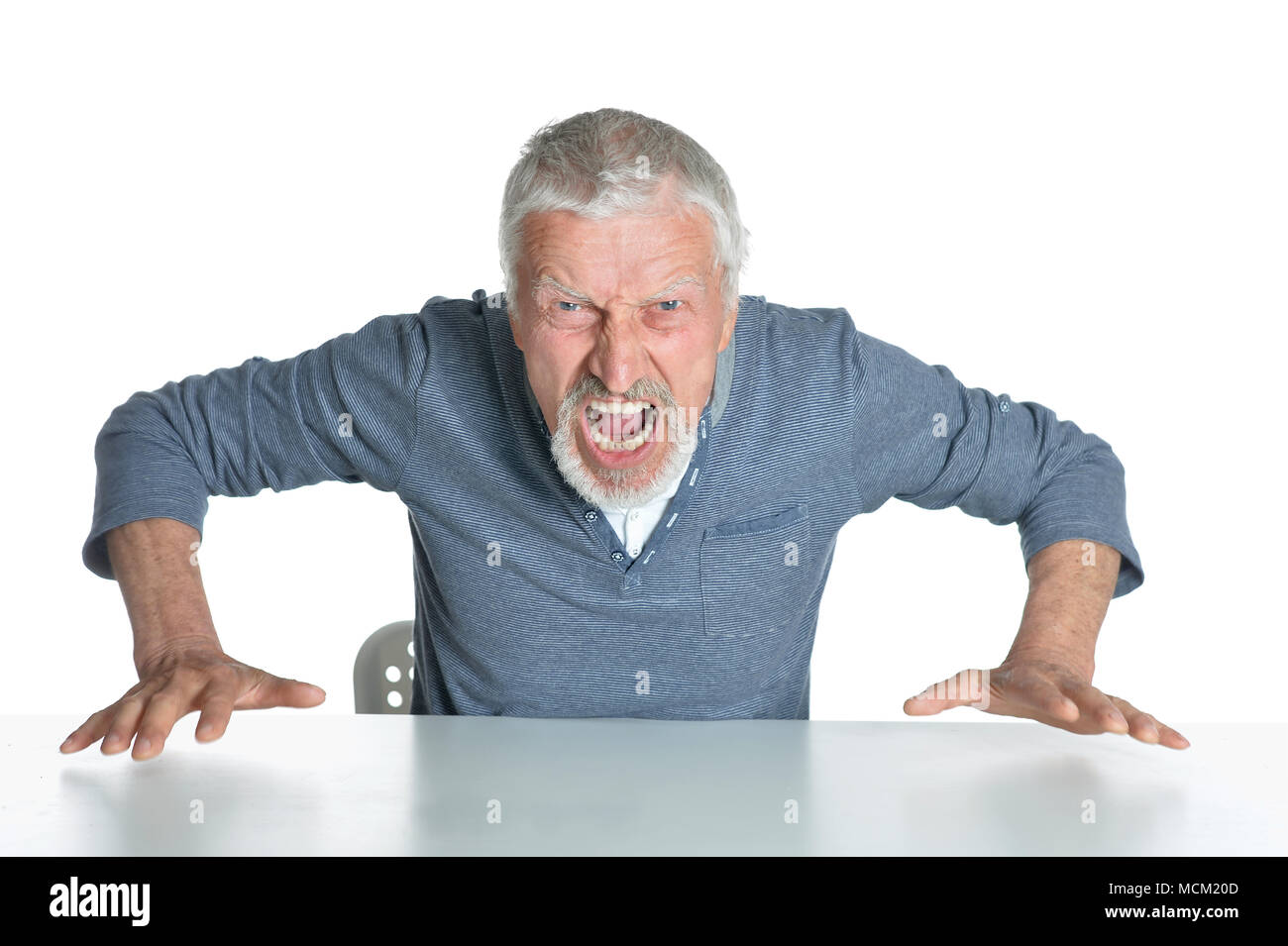 Portrait of a senior angry man Stock Photo - Alamy