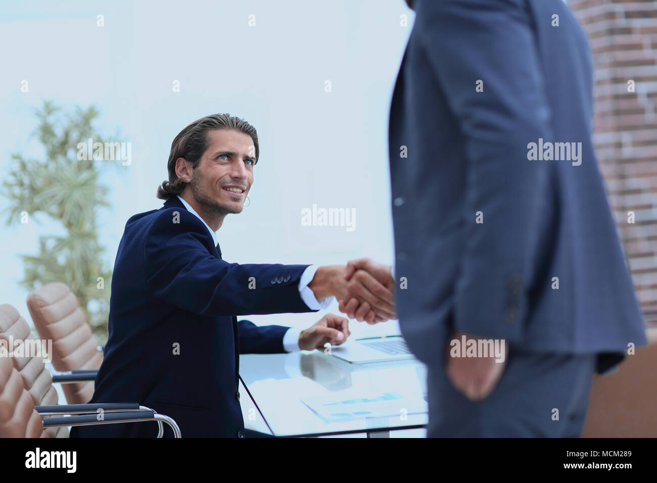 handshake colleagues in the office Stock Photo - Alamy