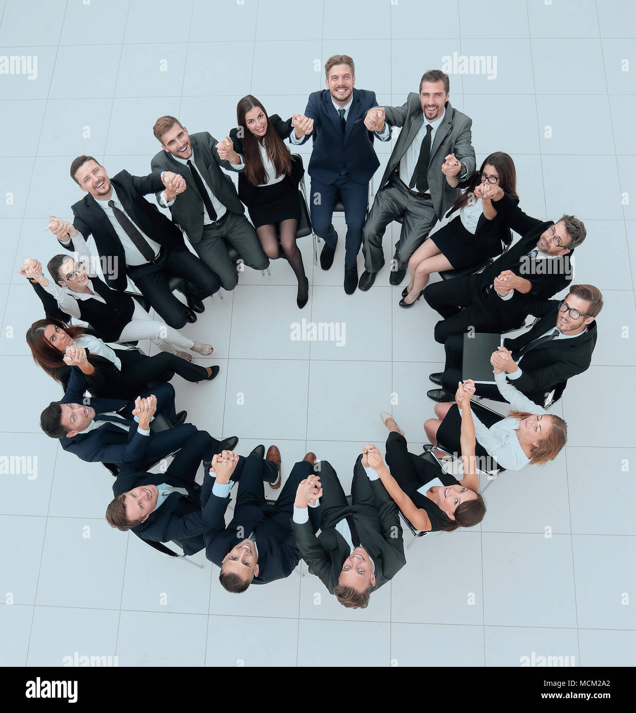 concept of team building .large successful business team sitting in a ...