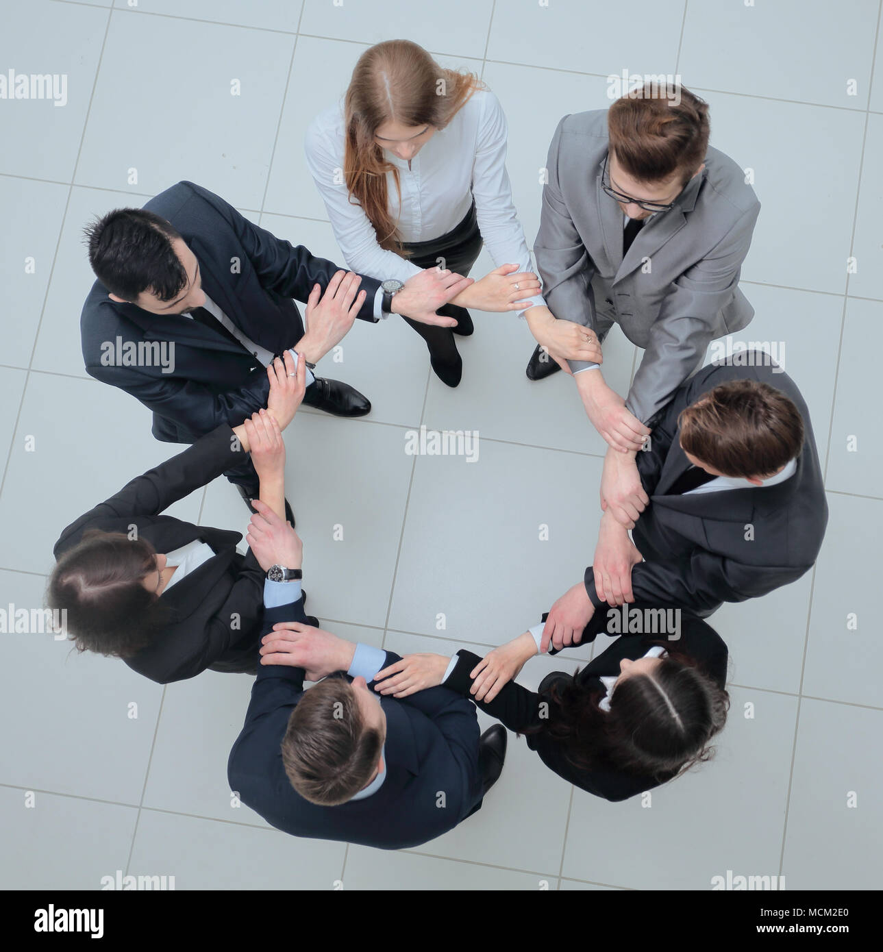 concept of partnership. business people standing in a circle Stock ...