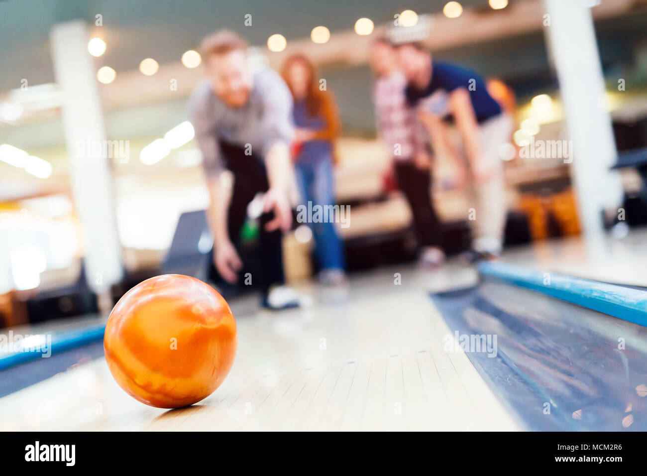 Men play bowling hi-res stock photography and images - Alamy