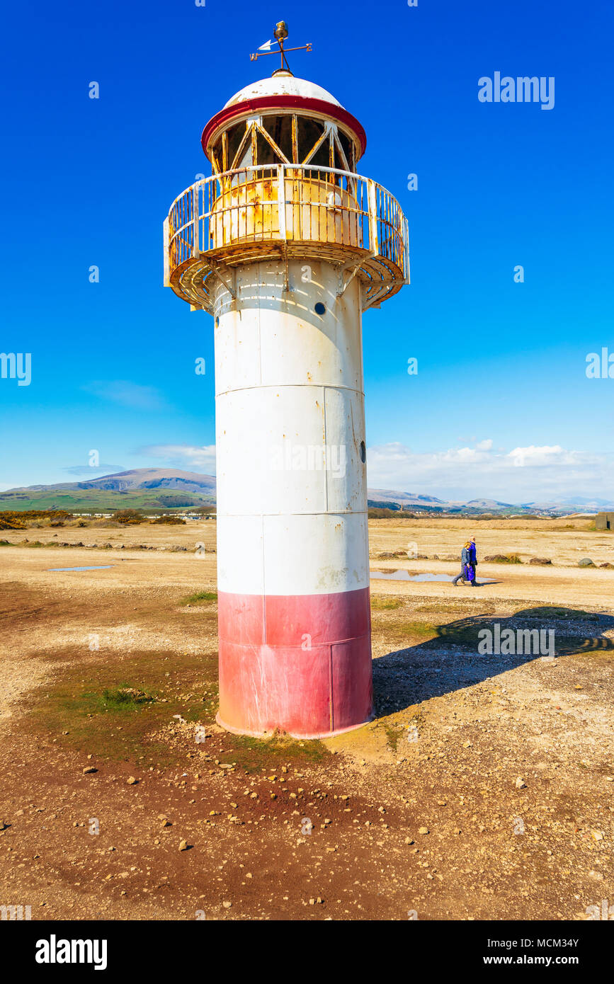 Derelict lighthouse at Hodbarrow Point near Millom, Cumbria. with Black ...