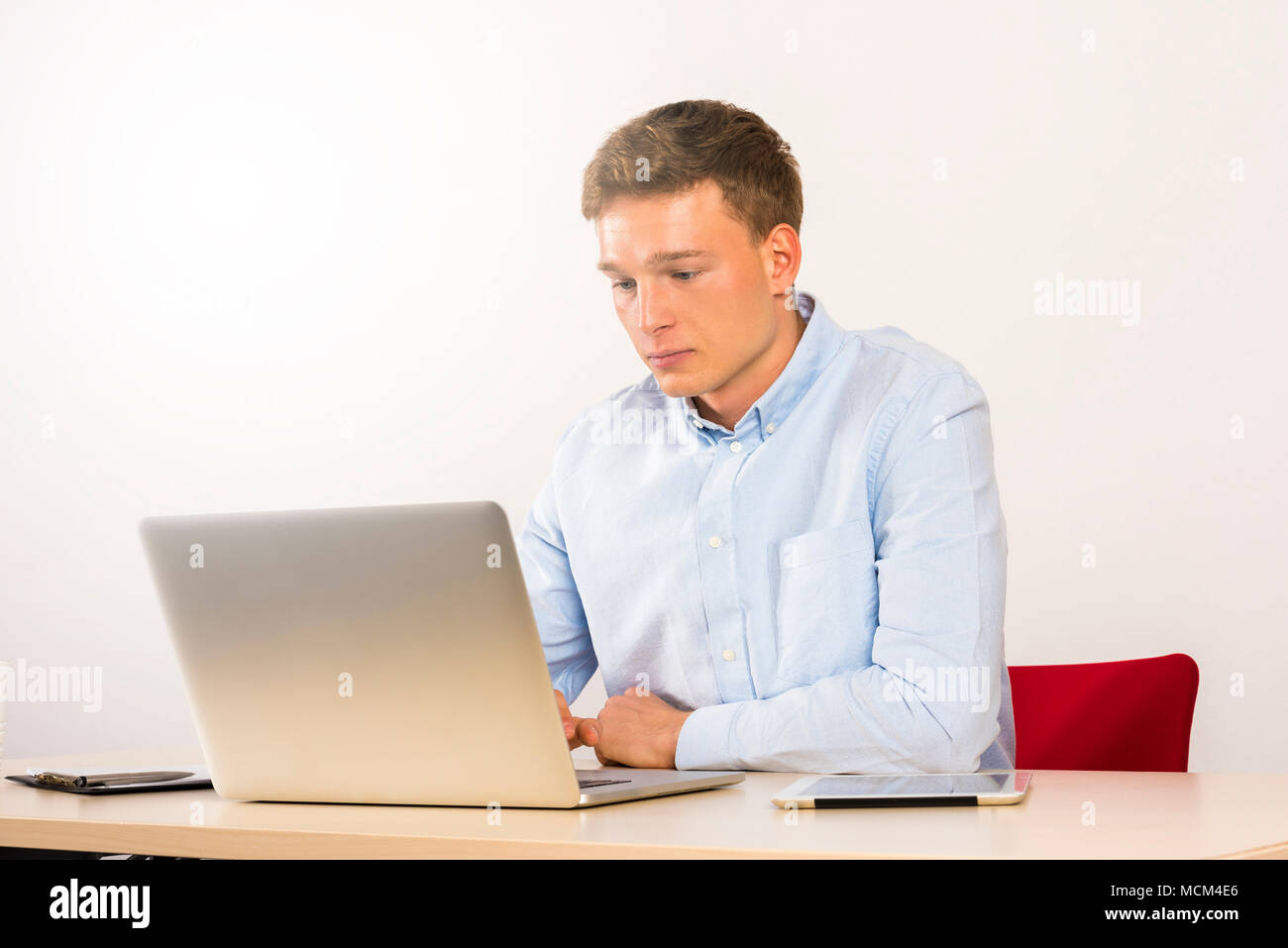 Office worker using computer hi-res stock photography and images - Alamy