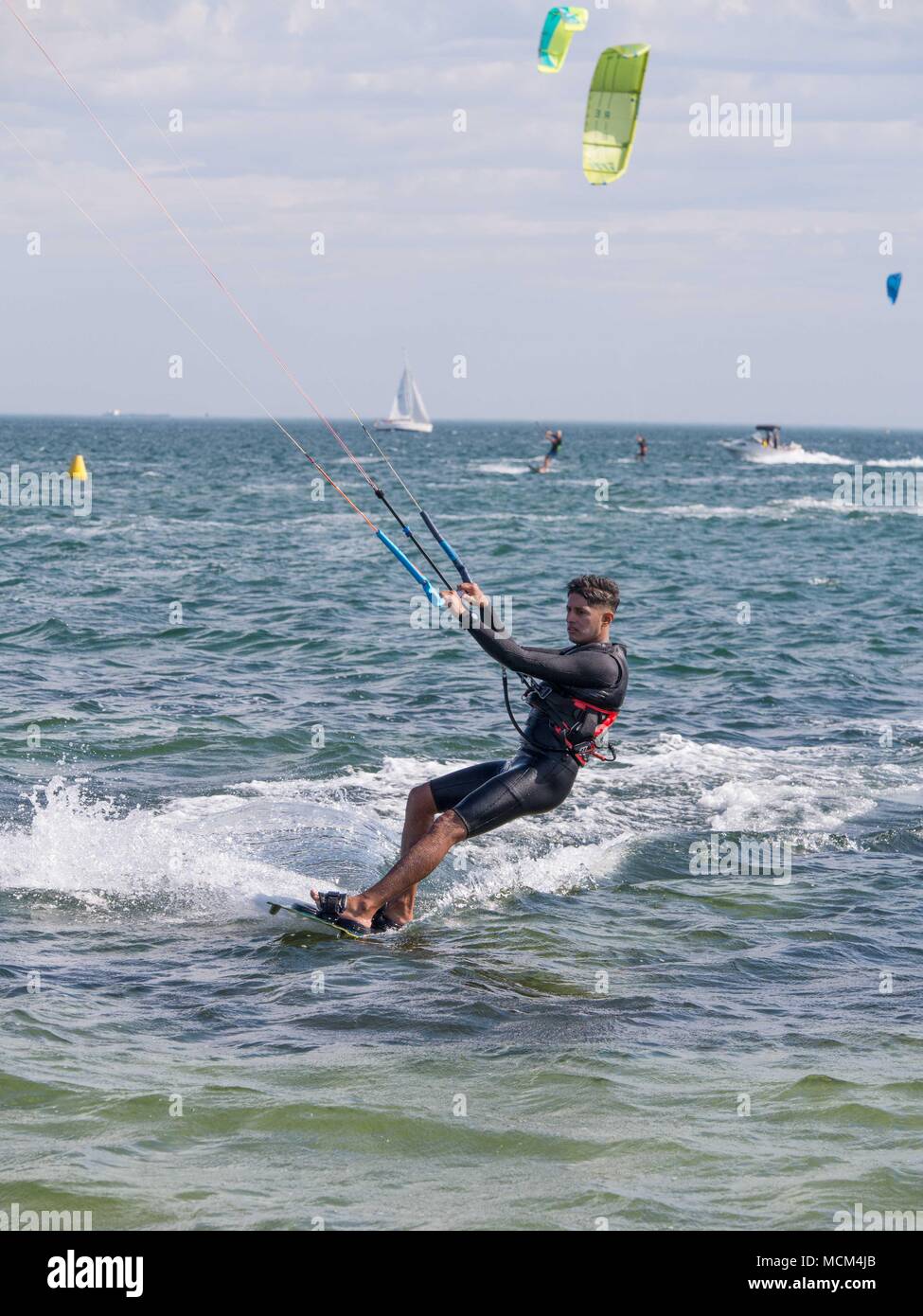 Kiteboarders and kitesurfers on Port Phillip Bay Australia speeding ...