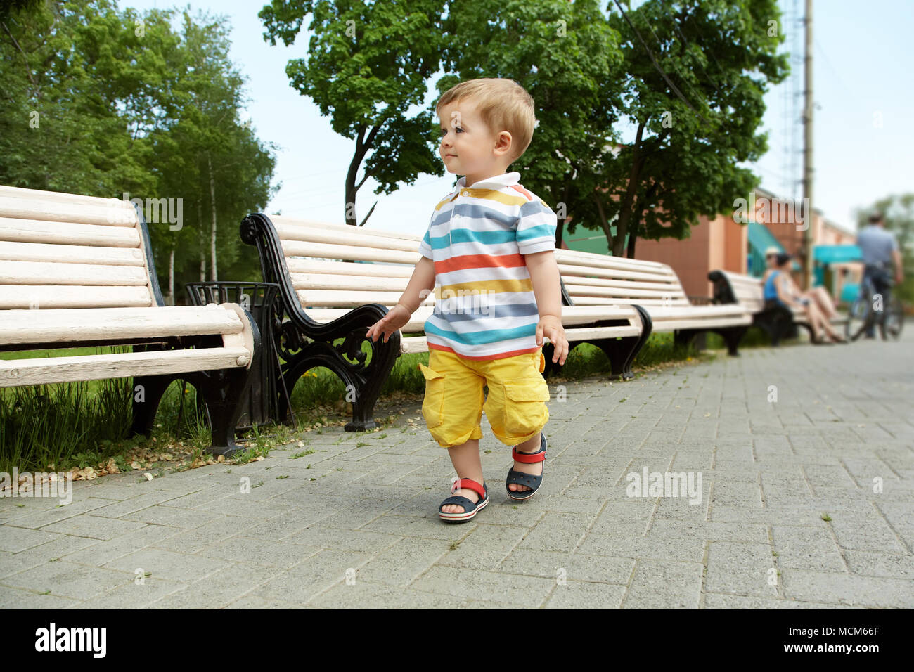 outdoor portrait of a boy. walking child in the summer park Stock Photo ...