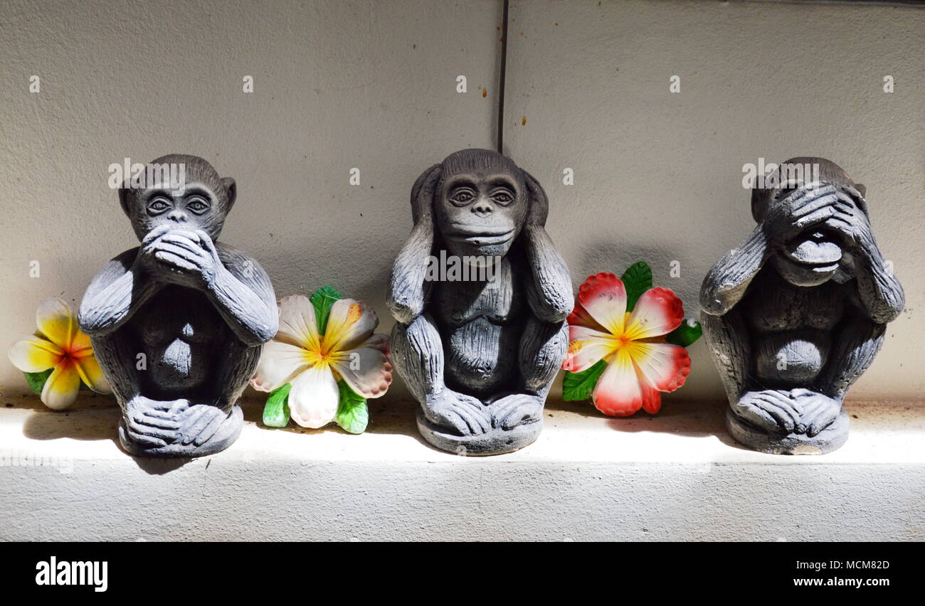 statue monkey closed mouth ear and eye symbol in religion Stock Photo ...
