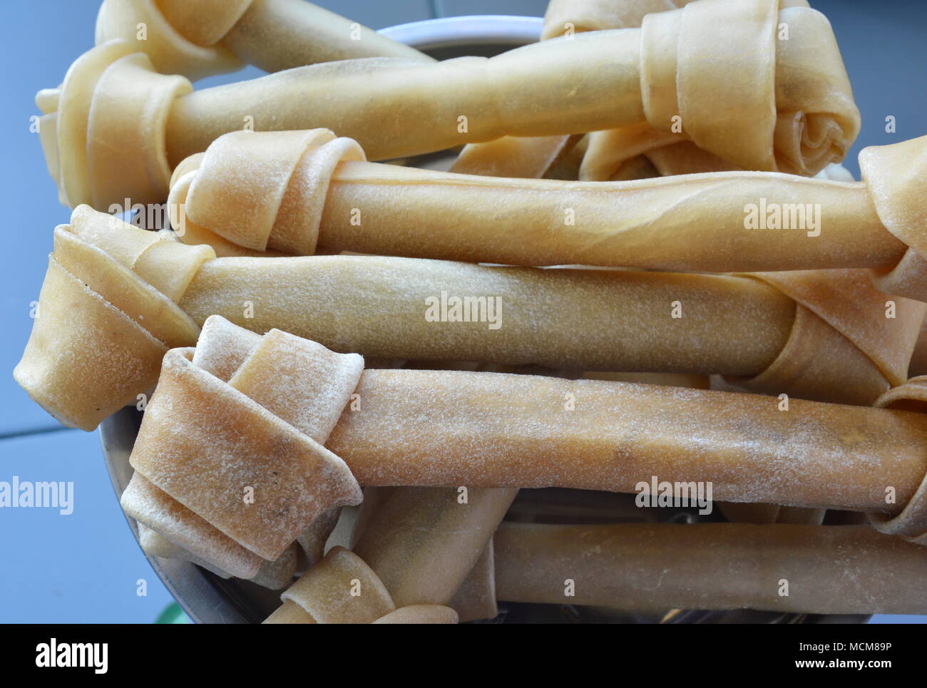dog bone on weighing scale for sale Stock Photo - Alamy