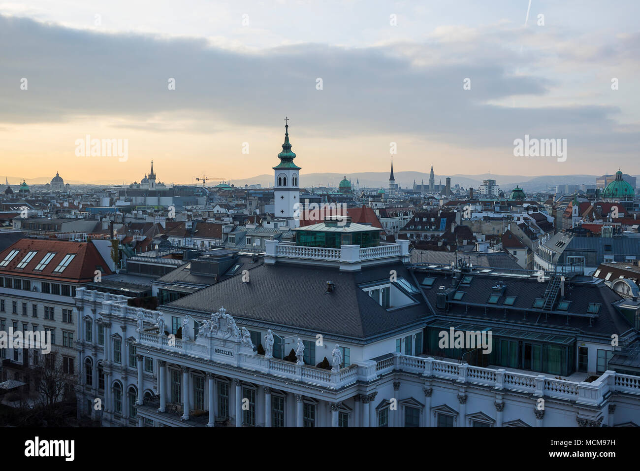 Vienna skyline at sunset with buildings Stock Photo - Alamy