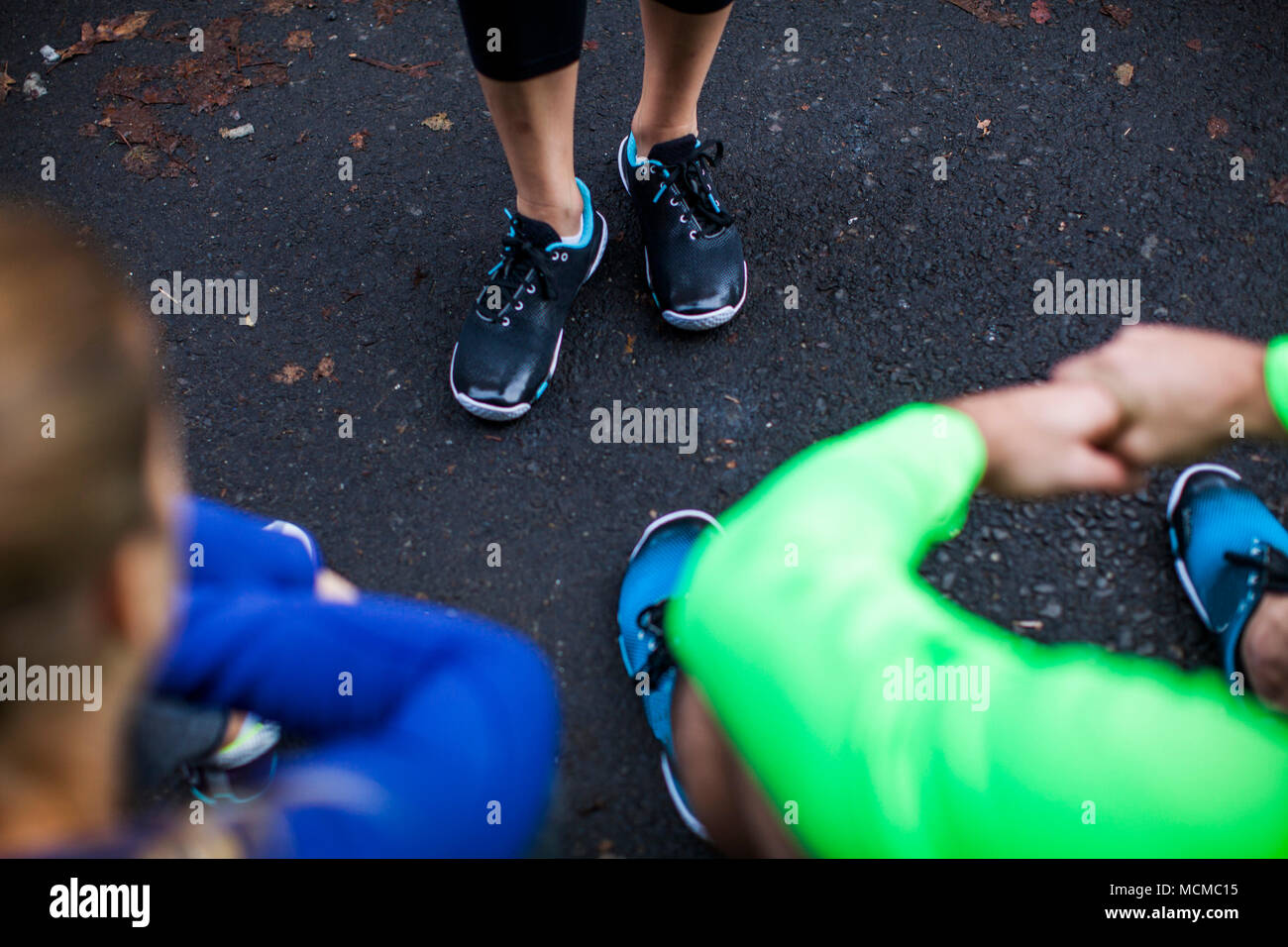 Three runners taking break while jogging, Seattle, Washington State ...