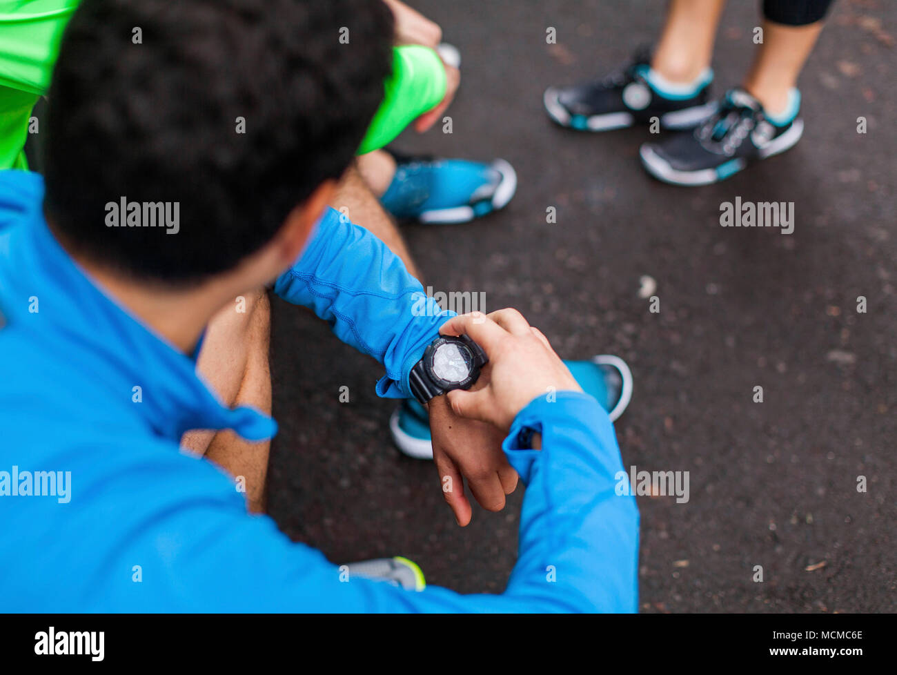 Man checking watch hi-res stock photography and images - Alamy