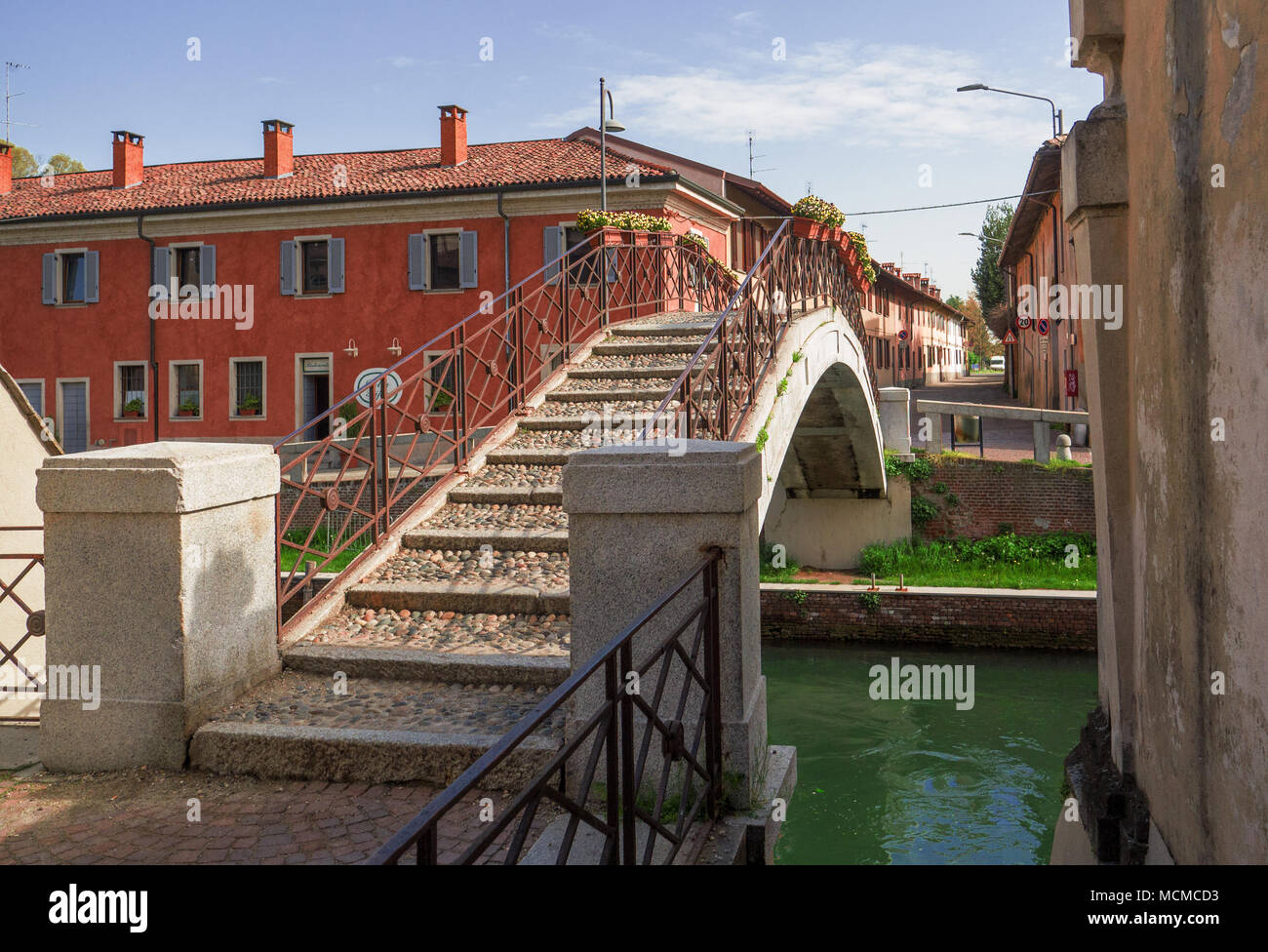 canal crossed by a cobblestone bridge, to move the houses of the ...