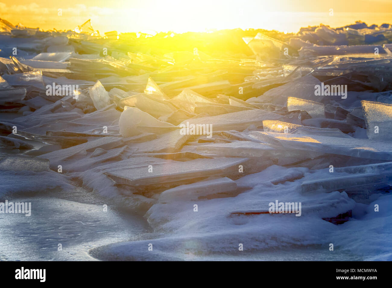 Joyful mood. Spring sparkles and shines on melting ice. Sun hits eye ...