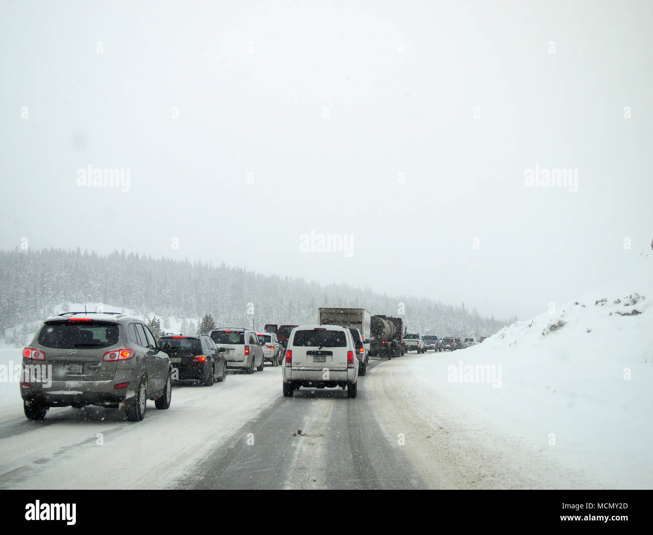 Colorado, snow covered highway Stock Photo - Alamy