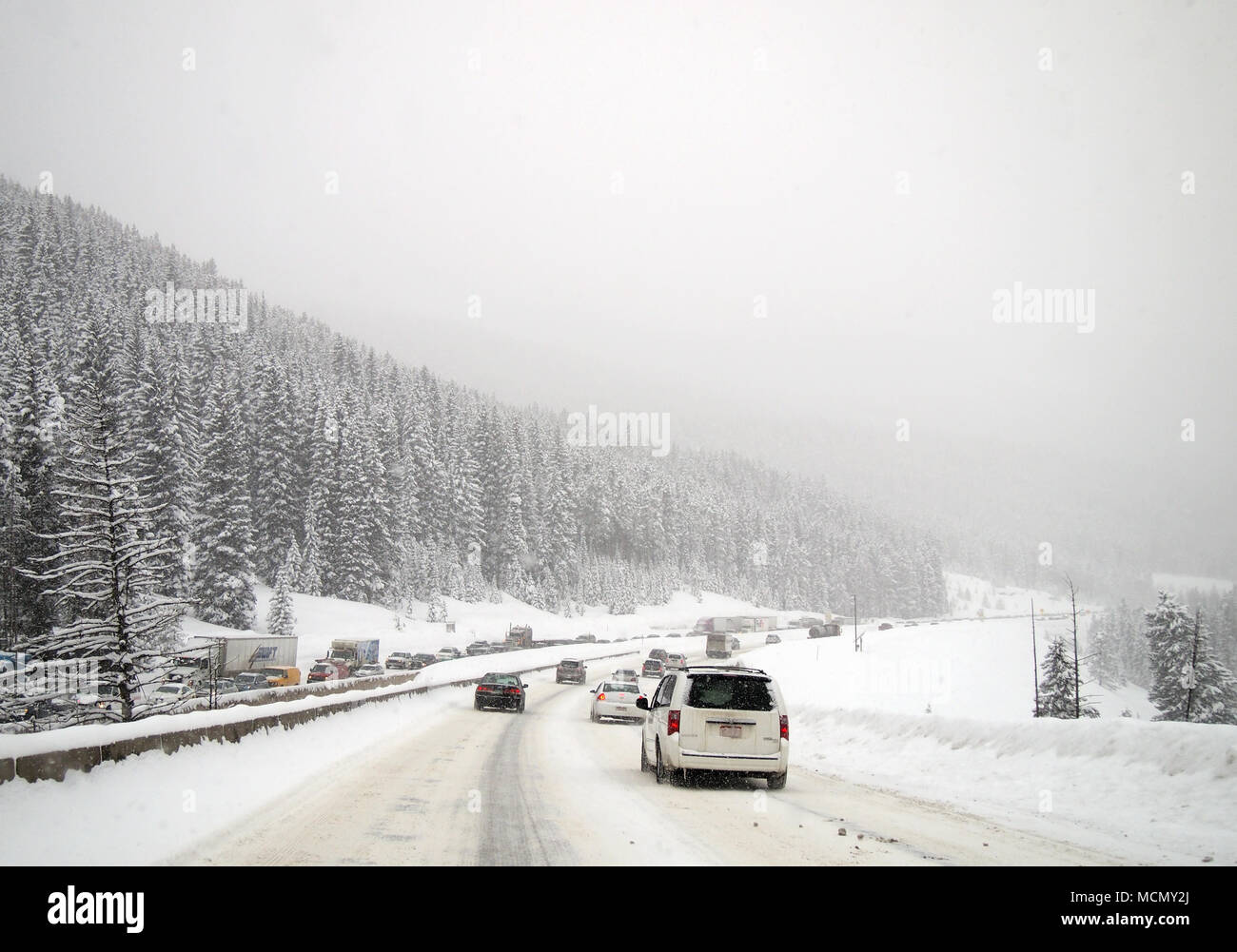 Colorado, snow covered highway Stock Photo - Alamy