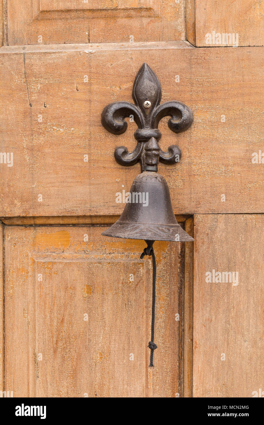 Old Bell On Wooden Gate Stock Photo - Alamy
