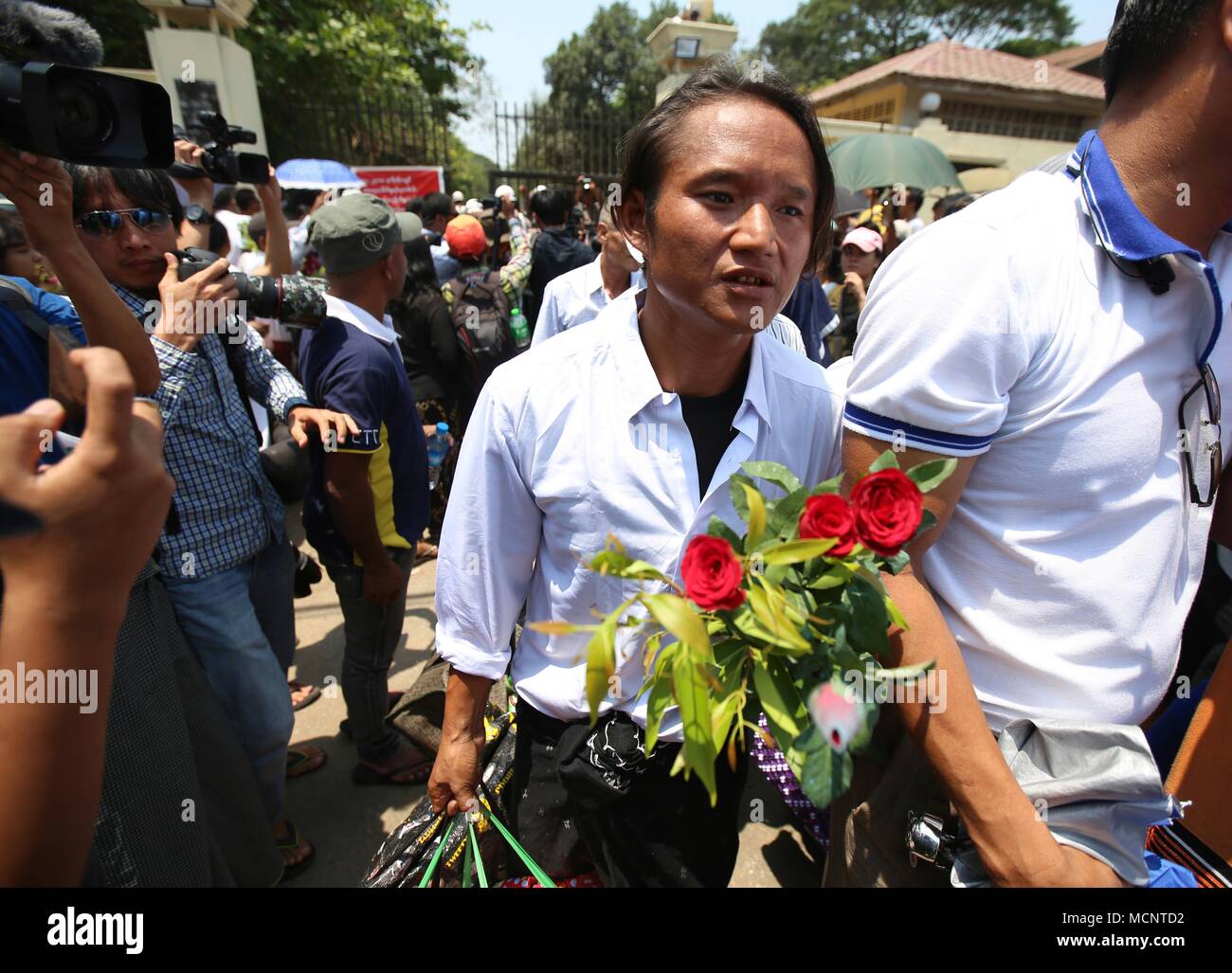 Yangon, Myanmar. 17th Apr, 2018. A released prisoner walks out from the ...