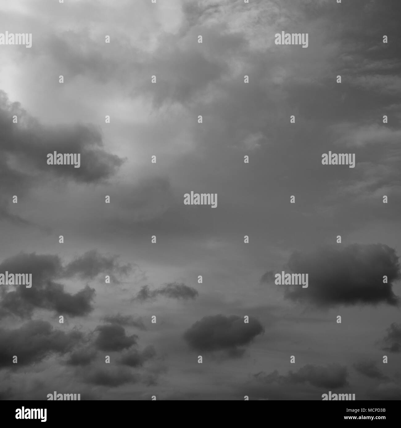 Rainy clouds flying over horizon. Gray clouds, overcast sky background ...