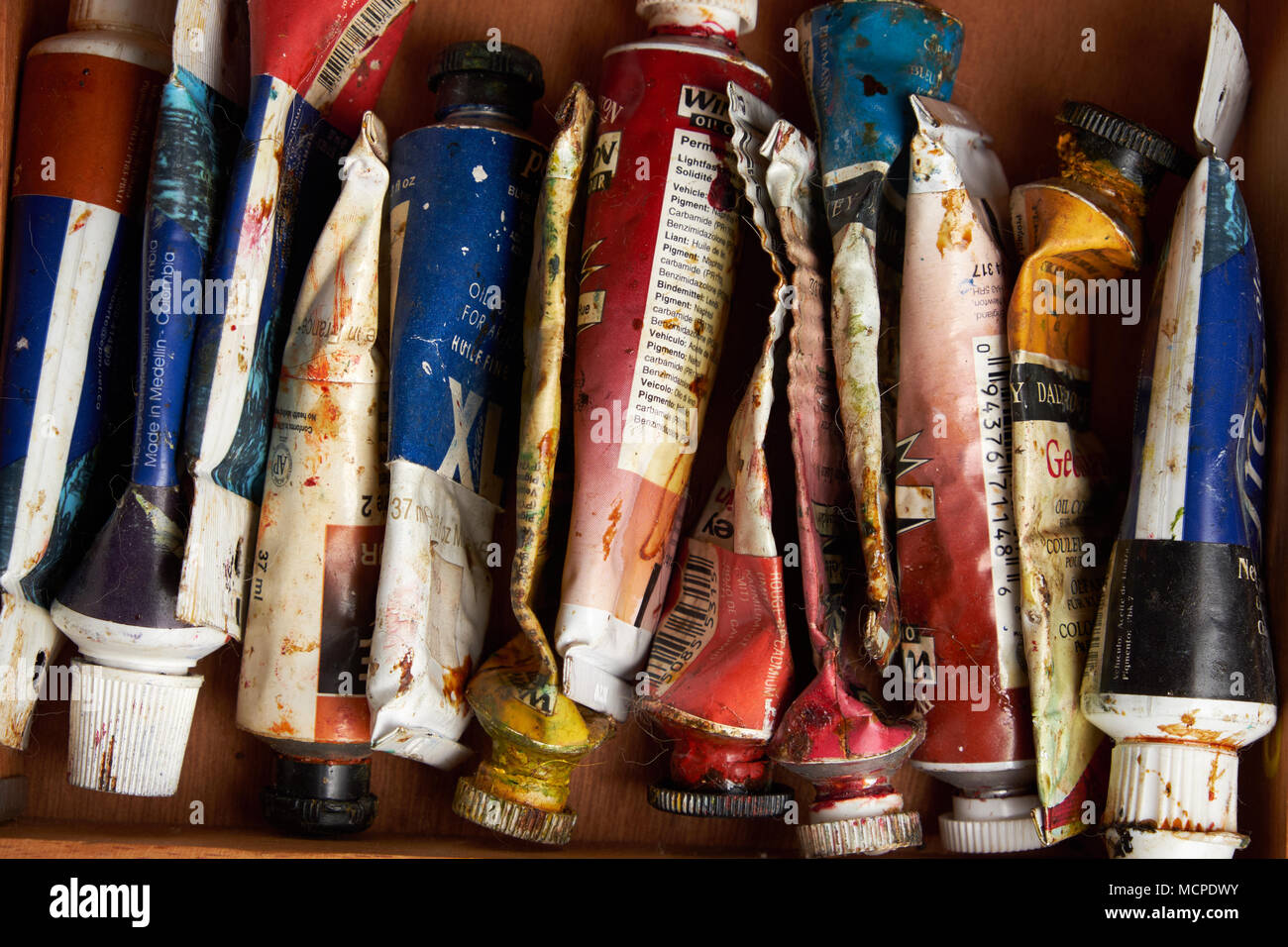 Paint tubes on a box (aerial view Stock Photo - Alamy