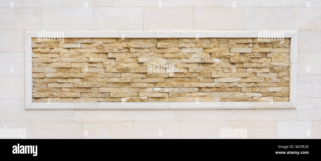 Antique brick wall with natural slim stone frame background. Stone wall ...