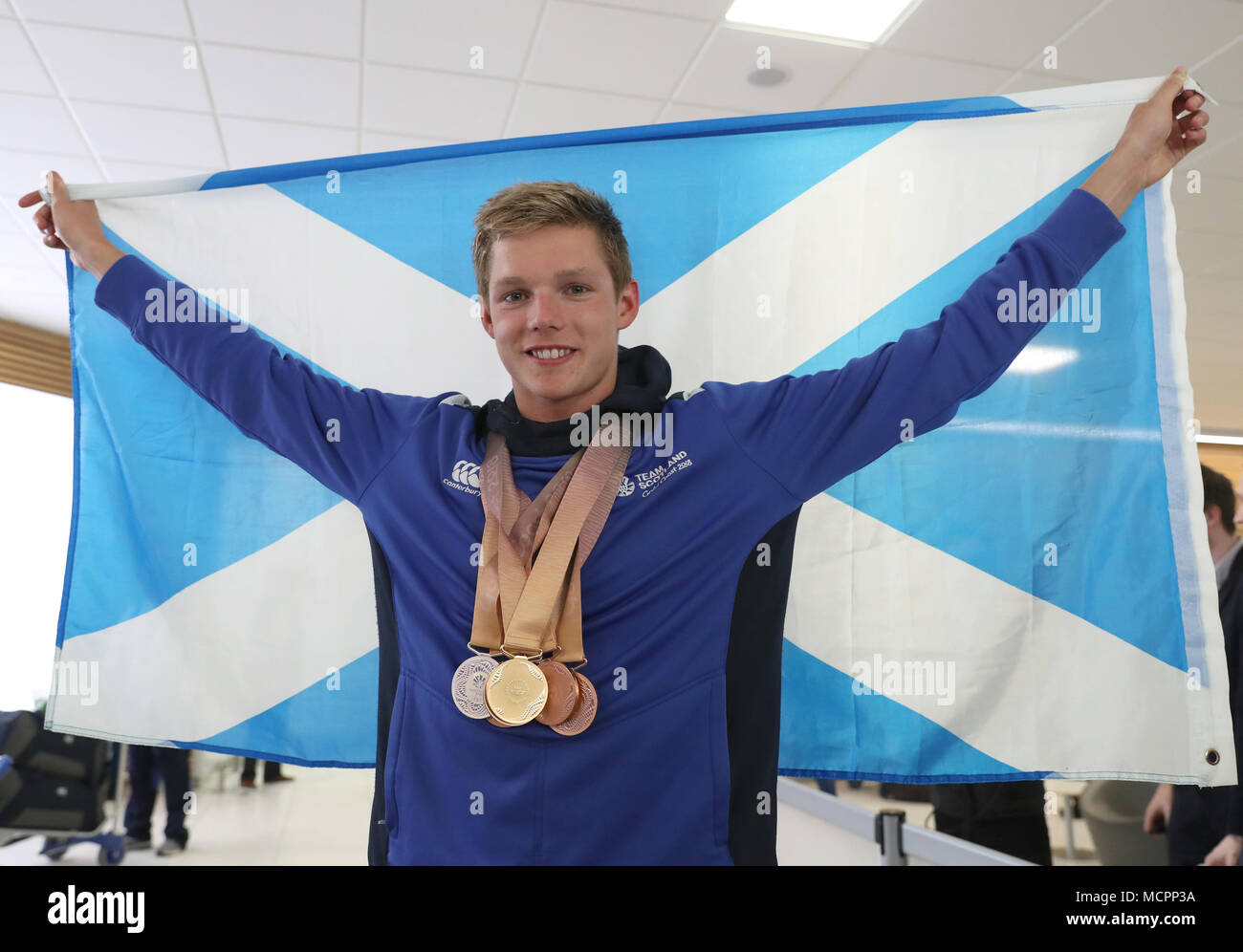 Swimmer Duncan Scott arrives at Glasgow Airport following the ...