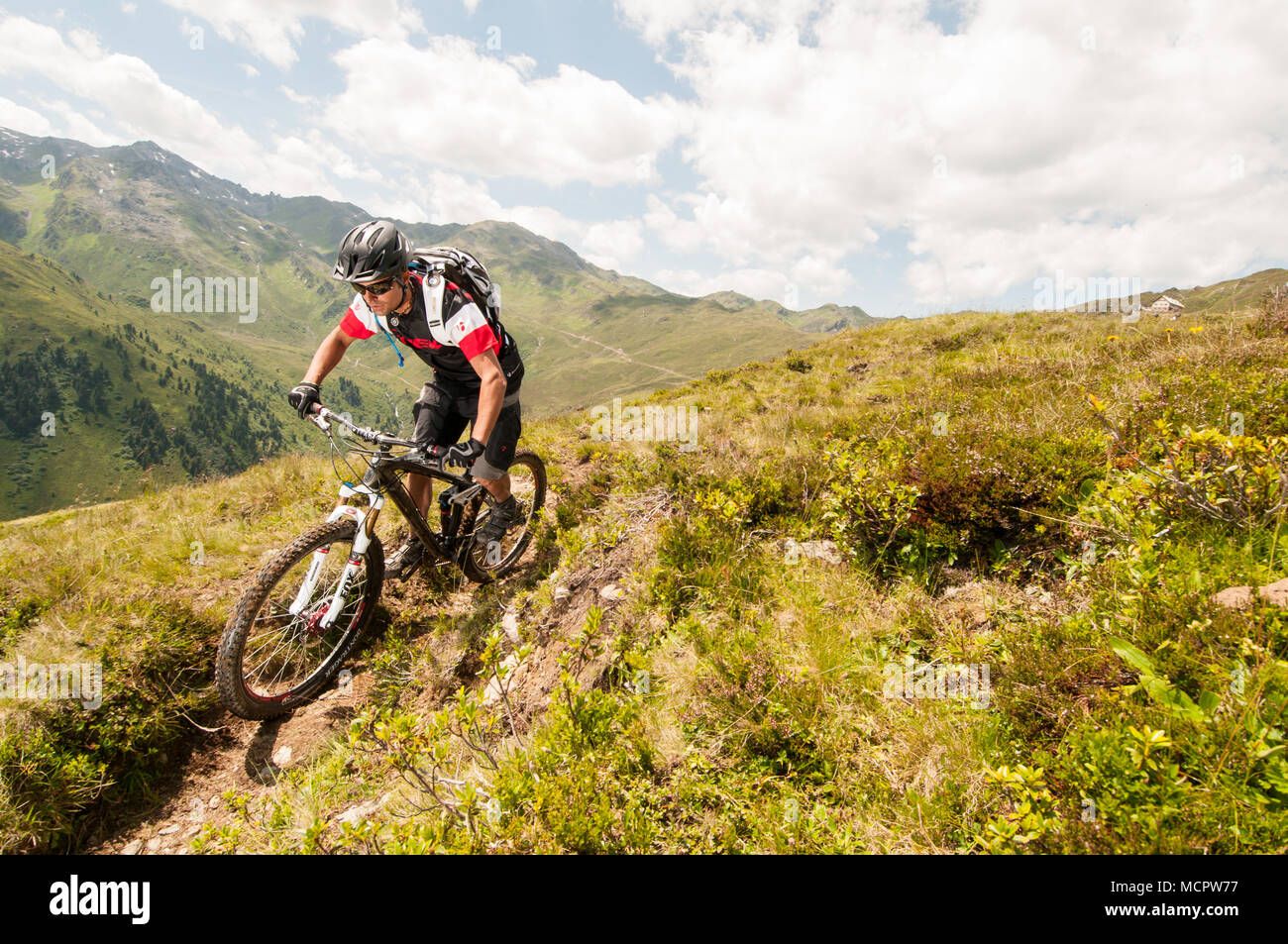 Mountain bike adventure in the Austrian Alps Stock Photo - Alamy