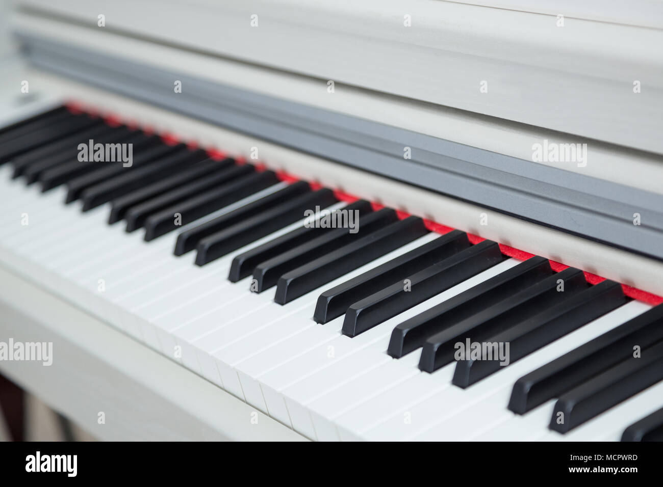 Close up of wooden white piano keys Stock Photo - Alamy